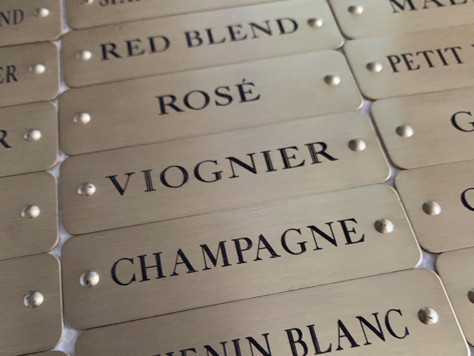 Custom Engraved Self-Adhesive Metal Tags – Durable Name Labels